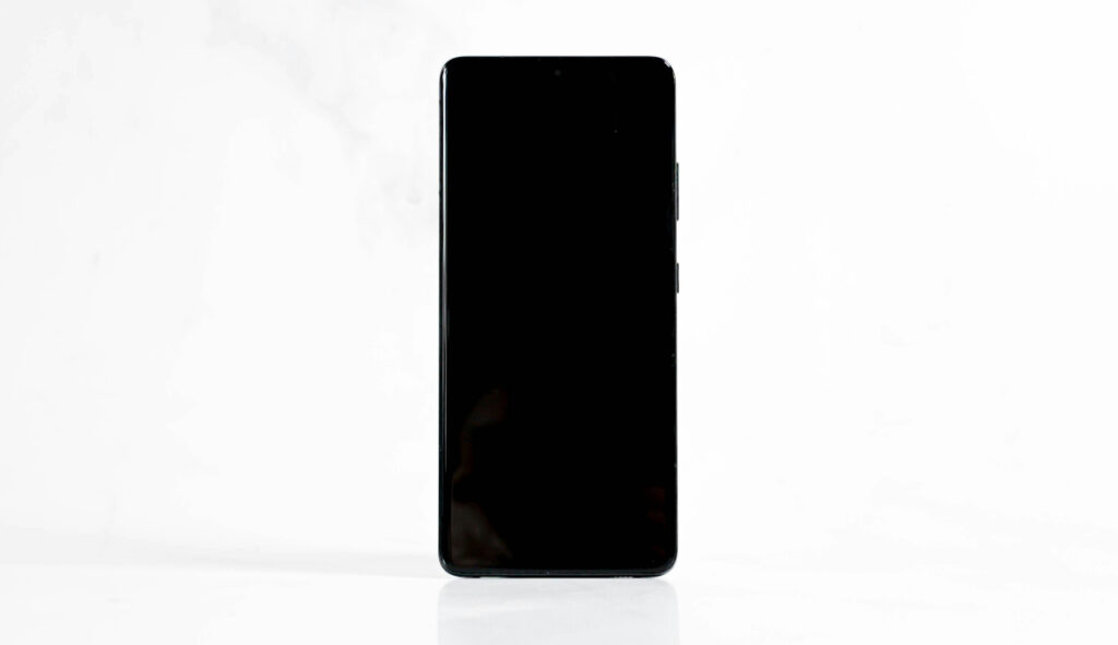 What should I do if my phone has a black screen after being hit?